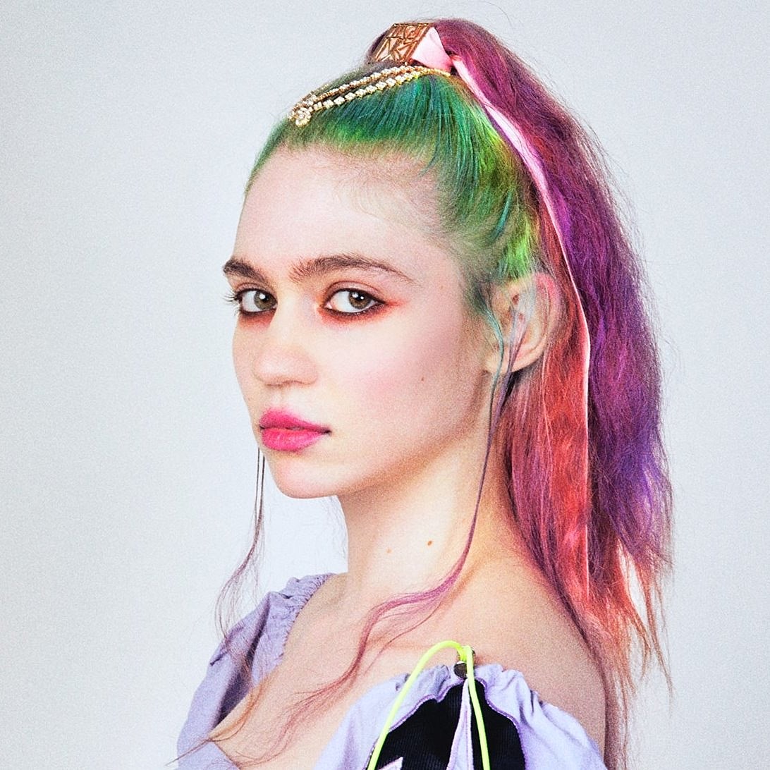 Grimes thinks "live music is going to be obsolete soon"