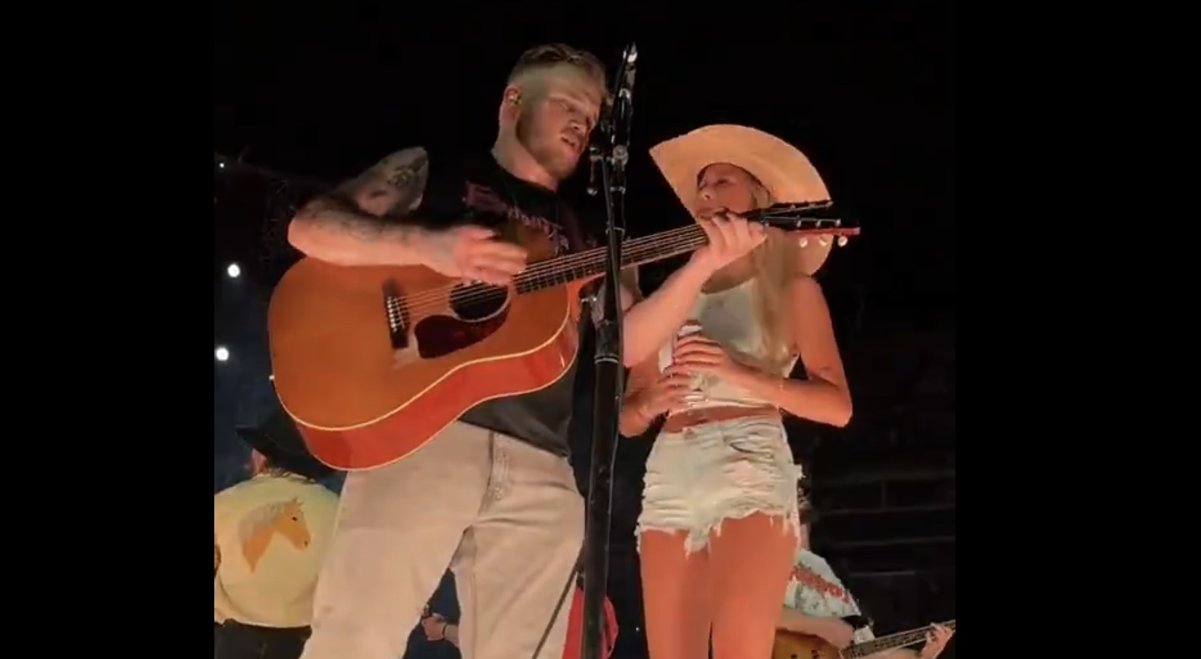 Watch Zach Bryan bring the Hawk Tuah girl on stage in Nashville