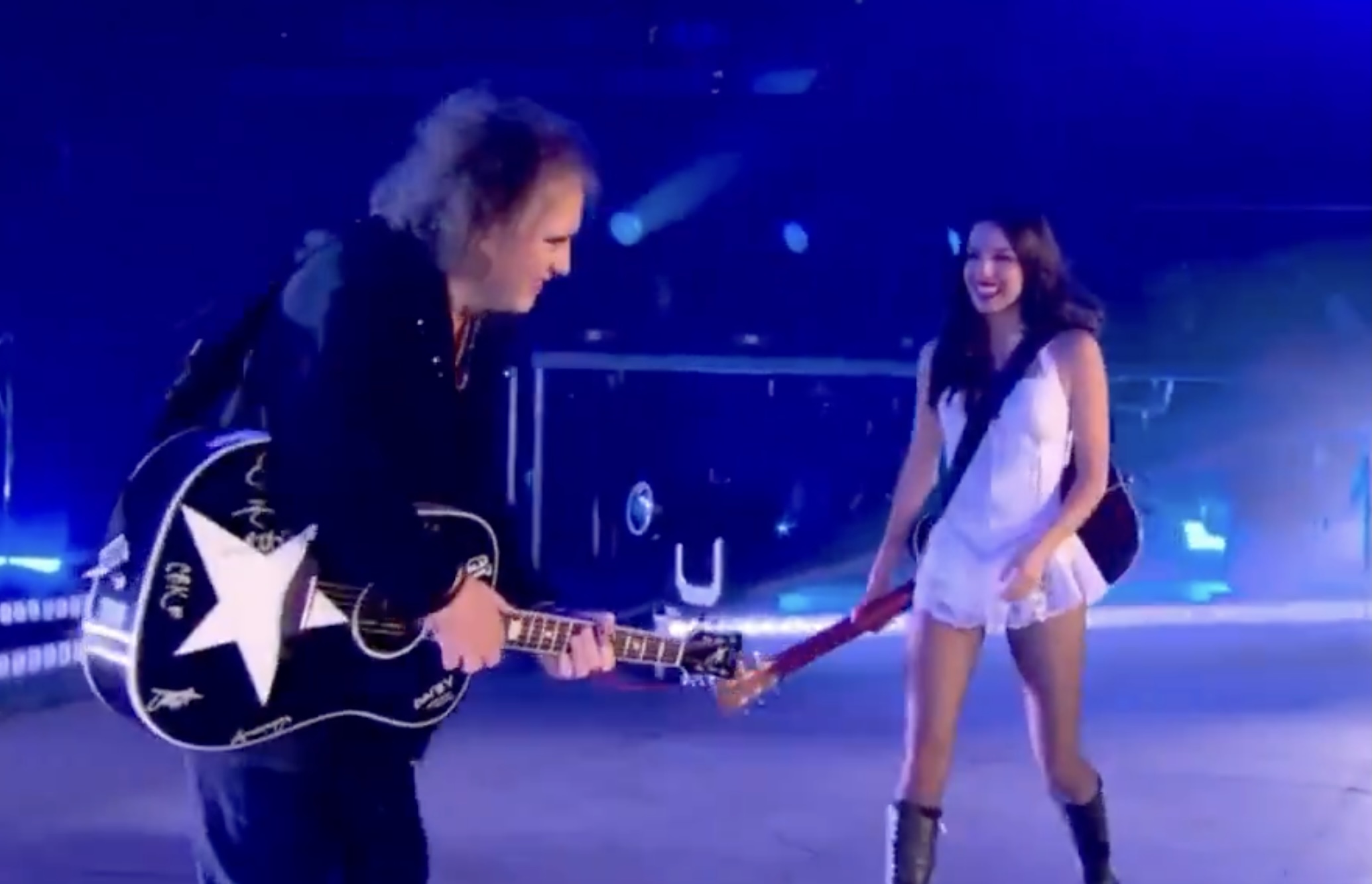 Watch Robert Smith join Olivia Rodrigo at Glastonbury for The Cure's "Friday I'm in Love" and ...
